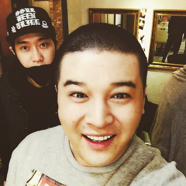 Shindong shows off his new haircut as he prepares to go to the army