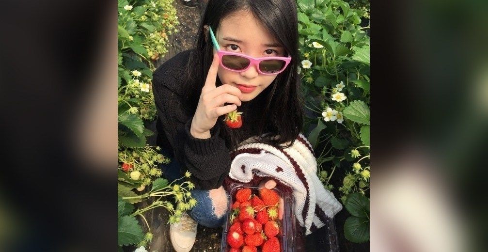 IU donate 100 million won to children from low income families on ...