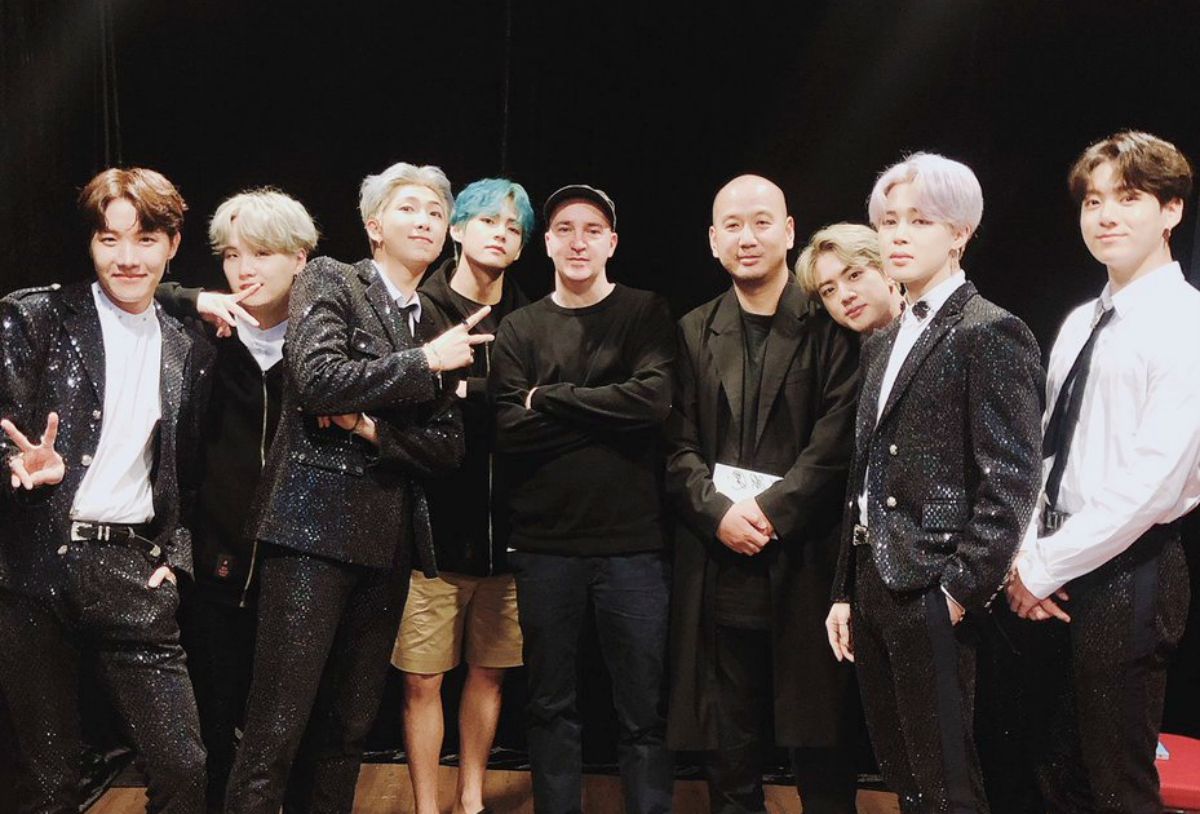 BTS Meets The Man Behind The Brand KAWS - Koreaboo