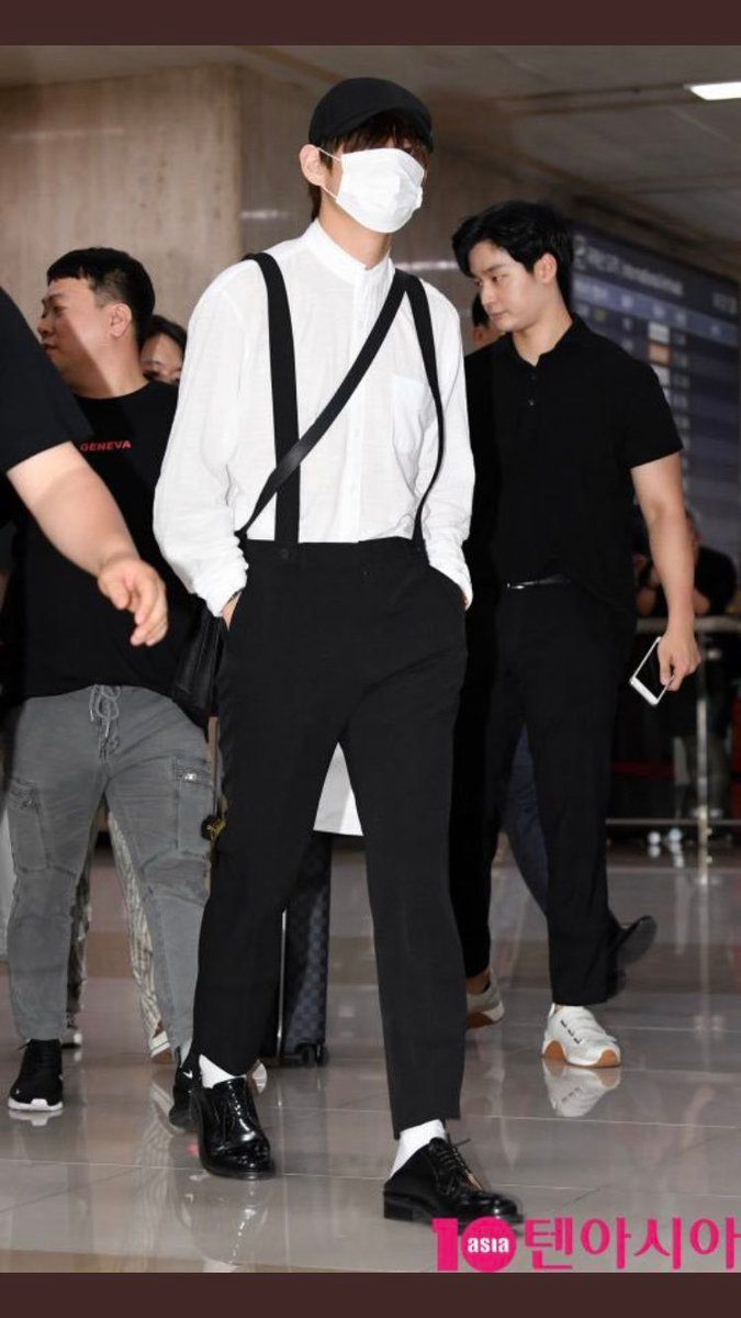 ARMYs Are Falling In Love With BTS's Hot Bodyguard, Because Whoa