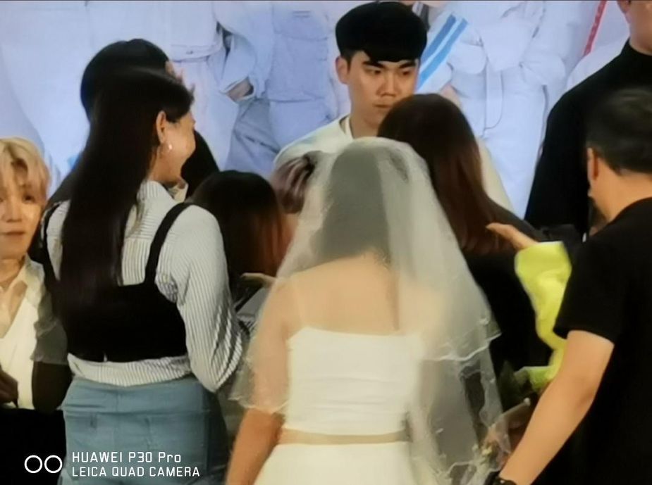 NCT's Doyoung Was Shook When A Fan Wore A Wedding Dress To Their Fansign - Koreaboo